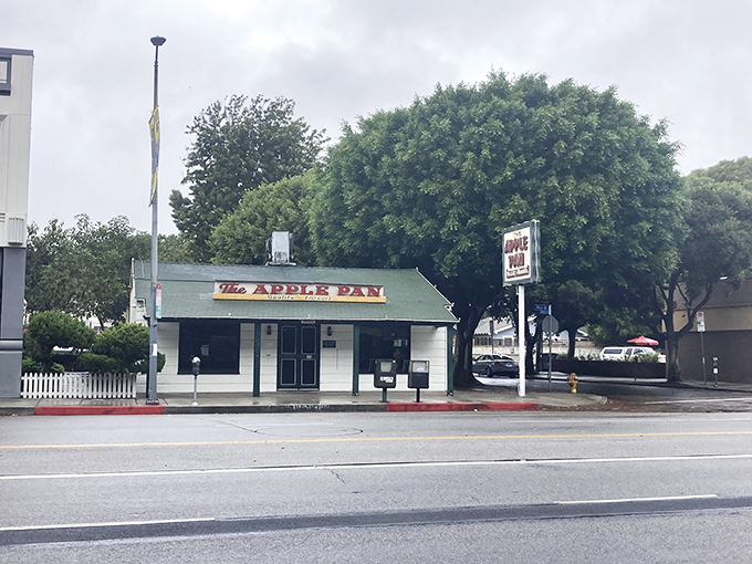 The unassuming exterior of The Apple Pan belies the culinary treasures within. Like finding a rare vinyl in a dusty record shop, this place is pure Los Angeles gold.