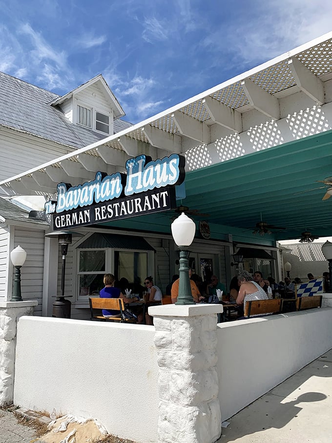 The charming facade of Bavarian Haus welcomes you with its distinctive blue and white signage&mdash;a little slice of Munich hiding in plain sight in Mount Dora.
