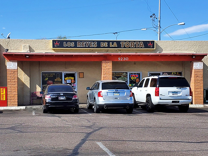 The unassuming exterior of Los Reyes de la Torta hides culinary treasures within. Like all great food adventures, this one begins with a humble storefront.