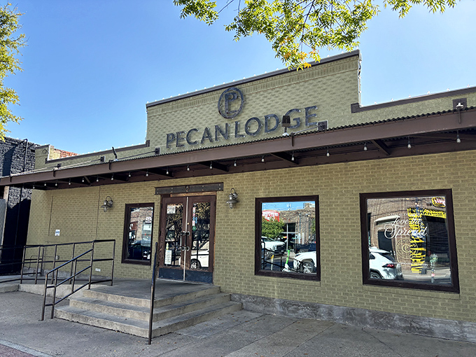 The unassuming tan brick exterior of Pecan Lodge belies the smoky treasures within. Like a Texas BBQ speakeasy, you'll know it by the line.
