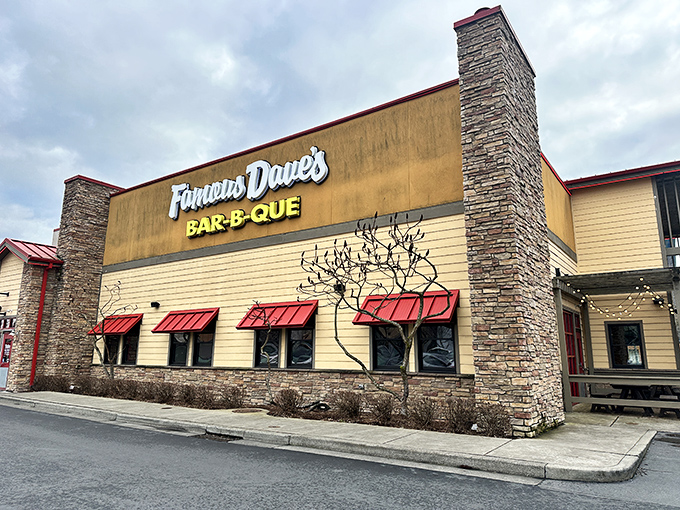 The stone-and-wood exterior of Famous Dave's stands like a temple to smoked meat devotion, beckoning hungry Portland pilgrims with its siren call.