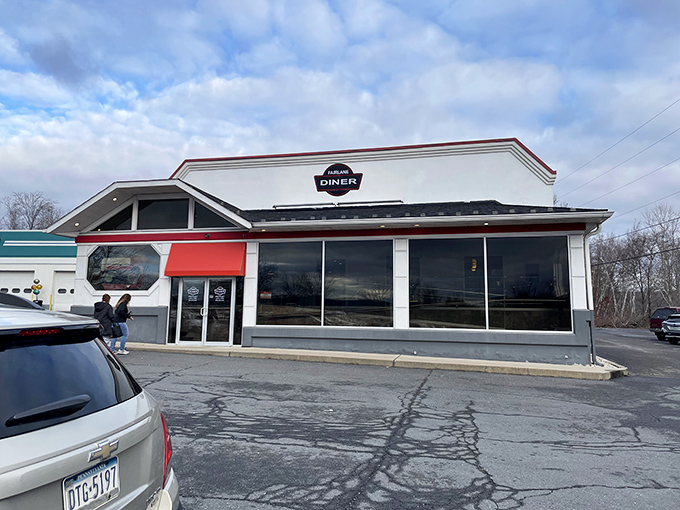 The classic diner silhouette of Fairlane Village Diner stands proudly against the Pennsylvania sky, like a time capsule of American comfort food traditions.