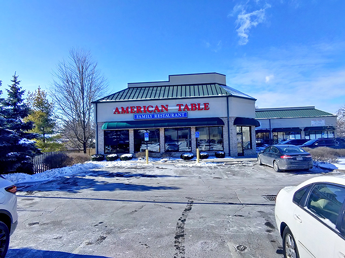 The unassuming exterior of American Table Family Restaurant stands as a beacon of comfort food promise in Oregon, Ohio. Some treasures don't need flashy signs.