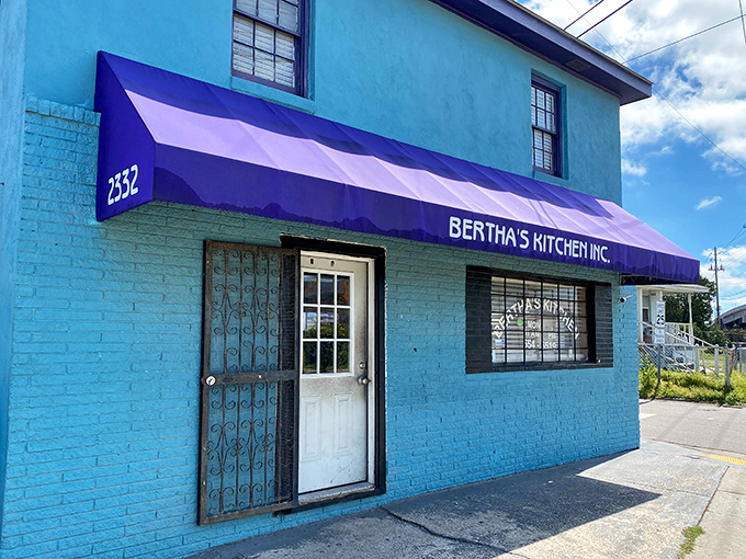 The turquoise beacon of Bertha's Kitchen stands out in North Charleston like a delicious mirage, promising soul food salvation to hungry travelers.