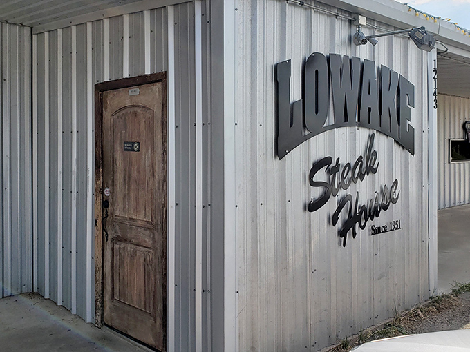 The unassuming exterior of Lowake Steak House proves once again that in Texas, the most spectacular steaks often hide behind the simplest facades.