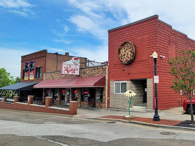 Luigi's iconic brick exterior and vintage sign have welcomed hungry Akronites for generations, standing like a delicious time capsule amid downtown's modern development.