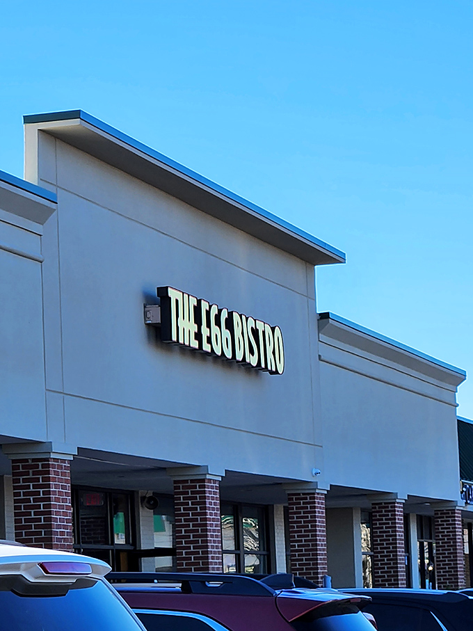 The bright yellow sign beckons like a breakfast lighthouse in a sea of strip mall sameness. Morning salvation awaits inside.