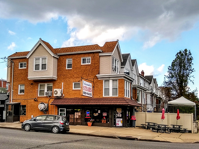 The corner brick building stands like a beacon of hope for the hungry, promising cheesesteak salvation in Philadelphia's Roxborough neighborhood.