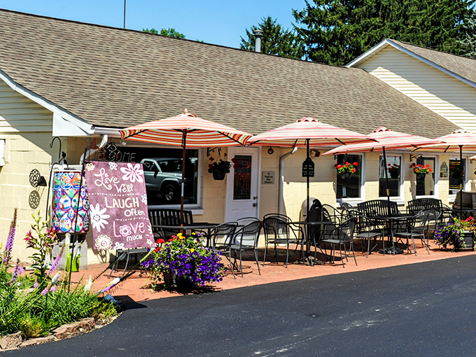 That cheerful ice cream sundae sign outside promises sweet endings to every savory beginning.