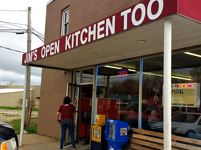 The iconic red awning of Jim's Open Kitchen Too stands as a beacon of breakfast hope on an otherwise ordinary Streetsboro street corner.