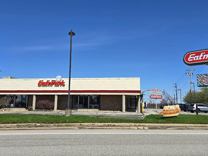 The iconic red and cream exterior of Eat'n Park stands like a beacon of comfort food promise against the Pennsylvania sky.