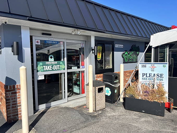 No architectural awards needed! Pinocchio's modest exterior with its tent-covered patio promises what truly matters&mdash;pizza perfection waiting inside.