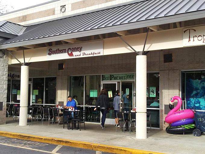 The unassuming storefront promises big flavor. That pink flamingo is just a hint of the personality waiting inside Southern Coney and Breakfast.