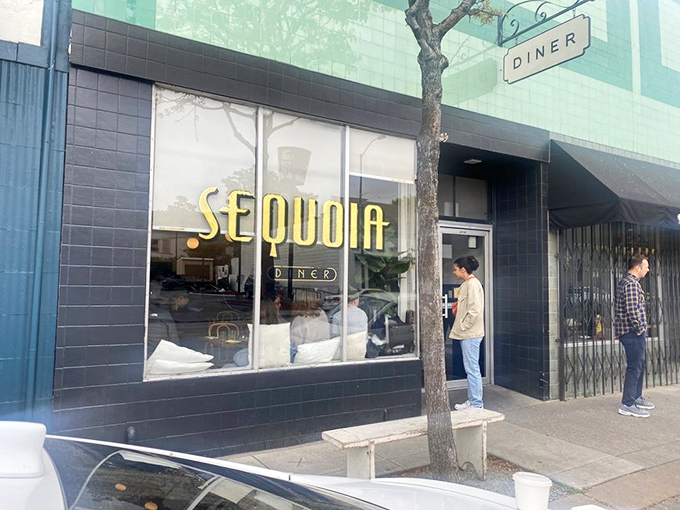 Art Deco meets morning magic &ndash; Sequoia Diner's mint-green facade stands proudly on Oakland's MacArthur Boulevard, promising breakfast revelations within those tiled walls.