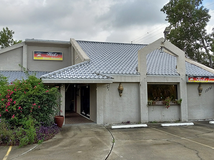 Heidi's unassuming exterior might fool you, but that German flag sign is basically a bat signal for schnitzel lovers across Florida.