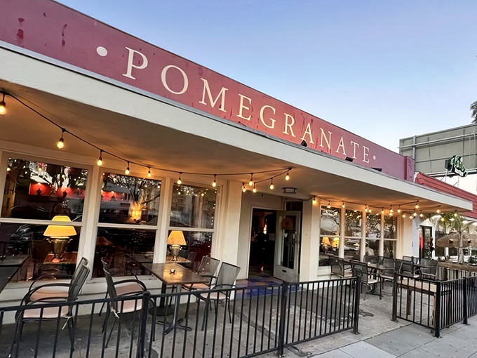 The burgundy awning of Pomegranate stands like a culinary embassy on El Cajon Boulevard, promising Georgian delights within its unassuming storefront.