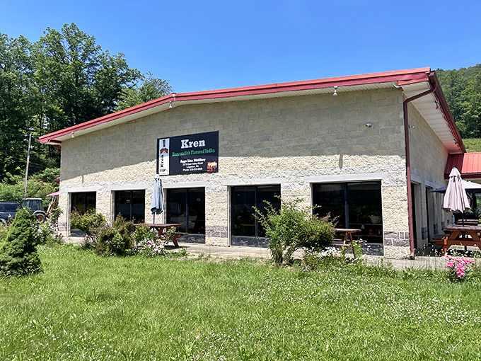 Nestled against Pennsylvania's rolling hills, Kavkaz Restaurant's modest exterior belies the culinary journey waiting inside. The red-trimmed roof signals: adventure ahead!