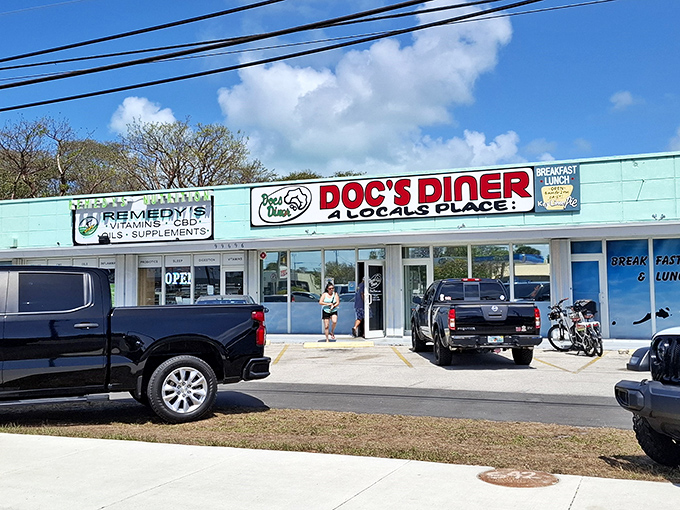 The unassuming mint-green exterior of Doc's Diner proves once again that Florida's best culinary treasures often hide in plain sight.