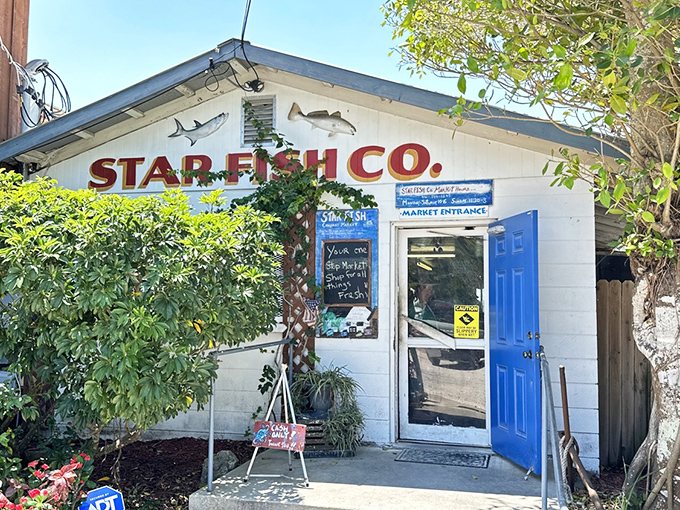 That bright blue door isn't just an entrance &ndash; it's your portal to Gulf Coast seafood paradise.