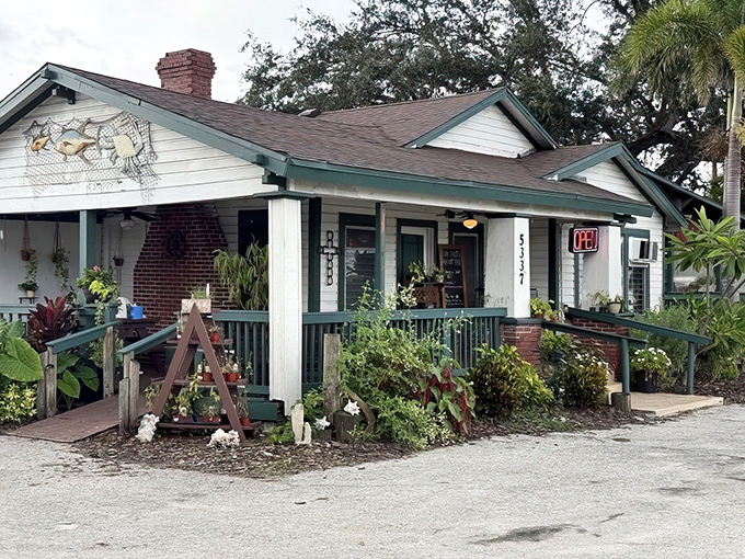 Old Florida charm doesn't get more authentic than this turquoise-trimmed cracker house. Like finding a postcard from 1950 that serves incredible seafood.