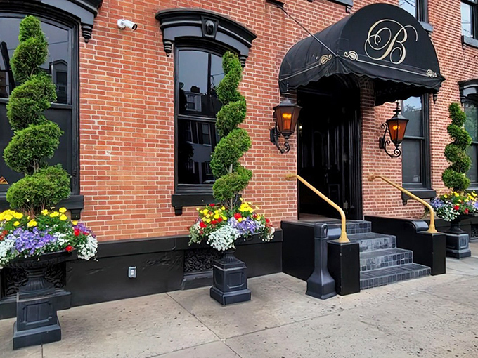 The elegant brick fa&ccedil;ade of The Belvedere Inn welcomes you with spiral topiaries and colorful flower displays. Victorian charm meets culinary excellence.