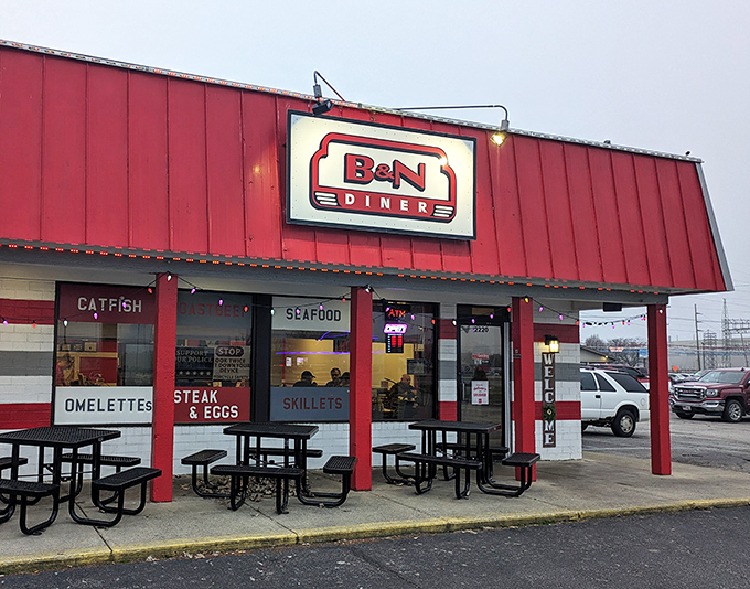 The bright red exterior of B&N Diner stands like a beacon of breakfast hope on a gray Indiana morning. Classic diner perfection awaits inside.