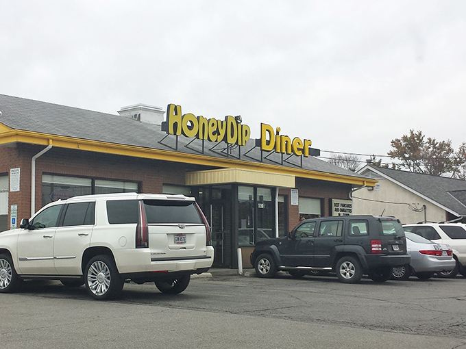The bright yellow sign of HoneyDip Donuts & Diner stands as a beacon of breakfast hope in Columbus, promising sweet salvation to donut pilgrims.