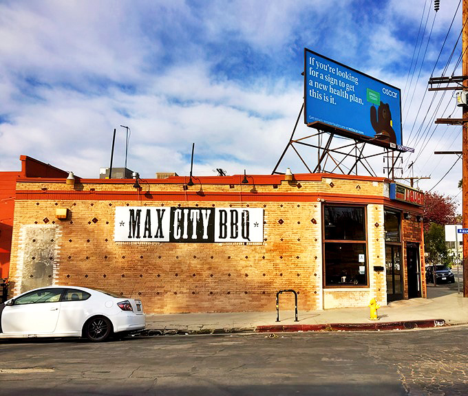 The blue and white checkered awnings of Max City BBQ beckon like a smoke signal to hungry Angelenos seeking authentic barbecue bliss.
