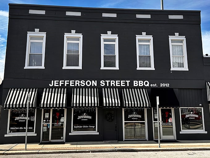 The sleek black exterior with crisp white trim isn't just eye-catching&mdash;it's a beacon of barbecue hope in small-town Indiana.