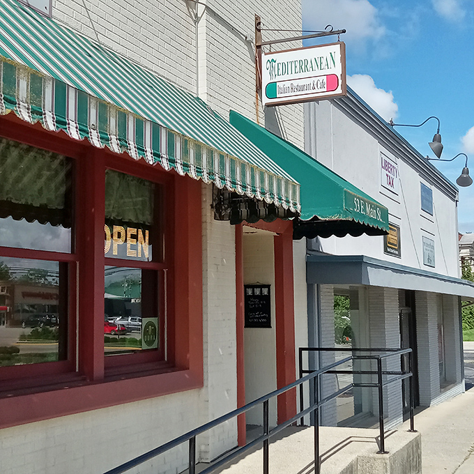 The unassuming storefront of Mediterranean Restaurant in Wilmington might not scream "culinary destination," but that green awning signals delicious treasures await inside.