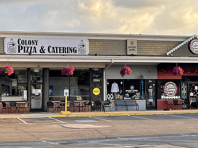 Colony Pizza's unassuming storefront hides culinary treasures within. Those hanging flower baskets aren't just for show&mdash;they're a welcome sign that good things await inside.