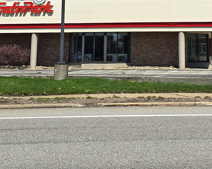 The iconic red Eat'n Park sign welcomes hungry travelers like a beacon of comfort food hope in Monroeville's restaurant landscape.