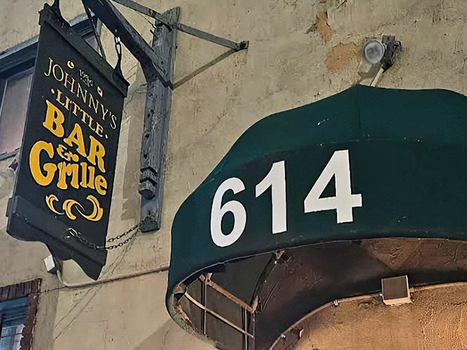 The unassuming entrance to Johnny's Little Bar might be Cleveland's best-kept secret. That vintage sign promises more than just drinks&mdash;it promises an experience.