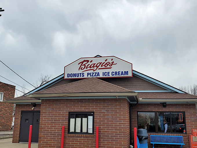 The unassuming brick fortress of flavor announces its holy trinity right on the sign: donuts, pizza, ice cream. Culinary simplicity at its finest.
