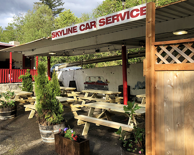 The "Skyline Car Service" sign might confuse your GPS, but your taste buds will thank you for finding this Portland burger sanctuary.