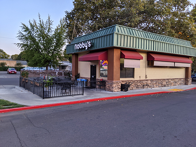 The unassuming green-roofed kingdom of burger bliss. Nobby's exterior might not scream "food destination," but locals know better than to judge this book by its cover.