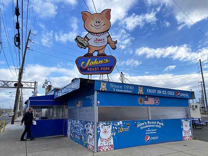The iconic blue shack with its cheerful cartoon pig mascot stands as a beacon of sandwich excellence in South Philly. No fancy frills needed when the food is this legendary.