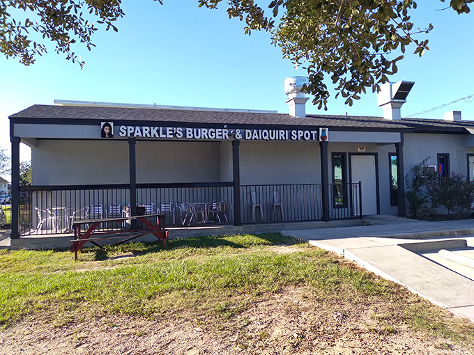 The blue sign with fireworks says everything: this place celebrates every burger like the Fourth of July.