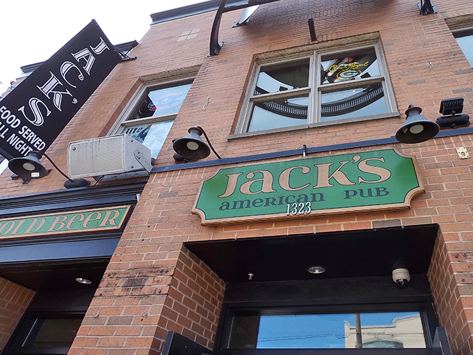 The iconic green signage of Jack's American Pub promises "Food Served All Night" &ndash; a beacon of hope for hungry night owls on Brady Street.