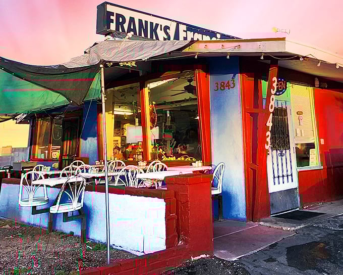 Frank's vibrant exterior is like a desert mirage, except this oasis delivers actual sustenance instead of hallucinations. The blue door beckons hungry travelers.