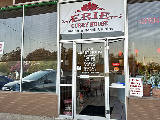 The unassuming storefront of Erie Curry House beckons with its simple red lotus logo and promise of Indian and Nepali cuisine&mdash;proof that culinary treasures often hide in plain sight.