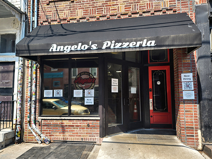 The unassuming storefront of Angelo's Pizzeria hides culinary treasures that have South Philly locals and visitors alike lining up daily. Worth every minute of the wait.