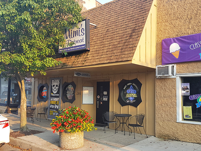 The unassuming exterior of Mimi's Retreat proves once again that culinary treasures often hide behind modest facades. Those porthole windows hint at nautical charm inside.
