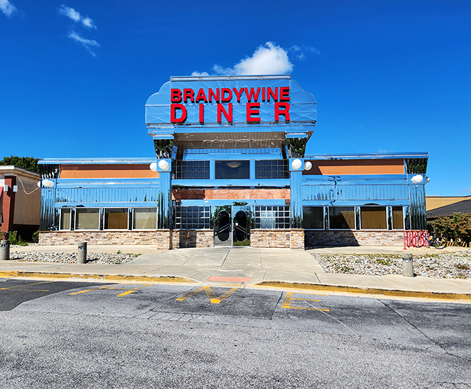 That gleaming chrome exterior isn't just architecture&mdash;it's a promise of comfort food nirvana waiting inside. The Brandywine Diner stands proud against the Delaware sky.