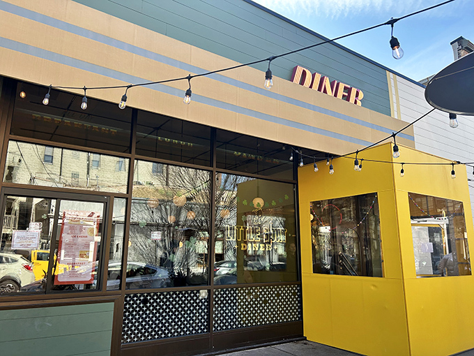 The sunshine-yellow exterior of Little Goat Diner stands out in Chicago's West Loop like a breakfast beacon calling to hungry souls.
