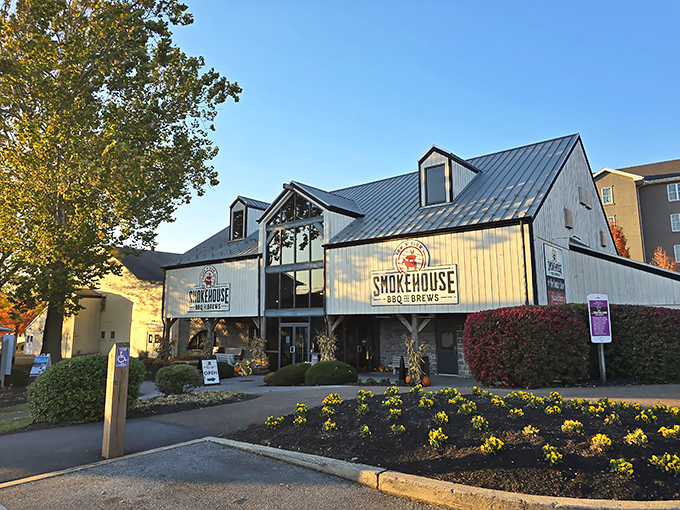 Barn-inspired architecture meets barbecue paradise. The Smokehouse's welcoming exterior promises smoky treasures within, standing proudly against Pennsylvania's blue skies.