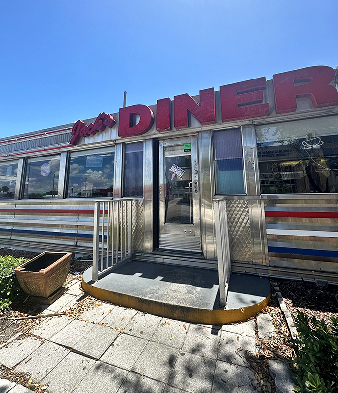The gleaming silver exterior of Jack's Hollywood Diner shines like a beacon of breakfast hope, promising classic American comfort in a nostalgic package.