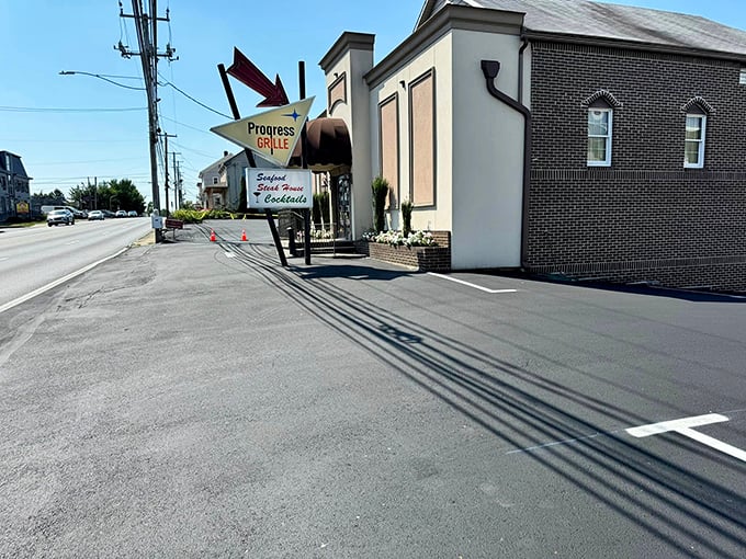 The unassuming exterior of Progress Grill hides culinary treasures within, like finding a winning lottery ticket in your winter coat pocket.