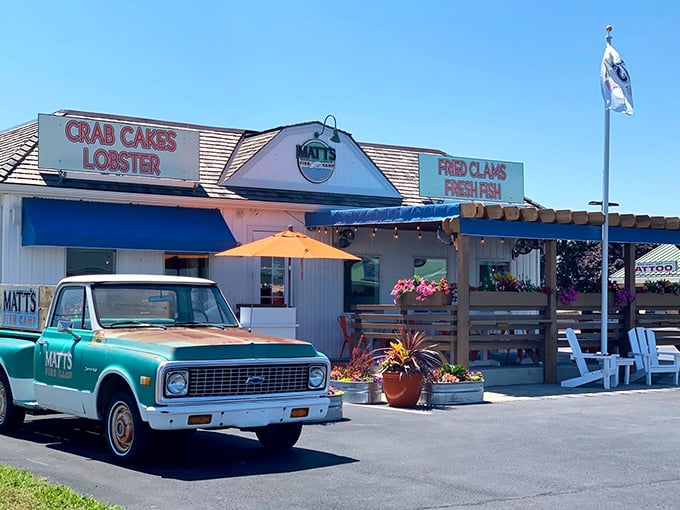 The coastal charm hits you before the first bite&mdash;white clapboard, blue awnings, and those inviting Adirondack chairs practically whispering "seafood paradise ahead."