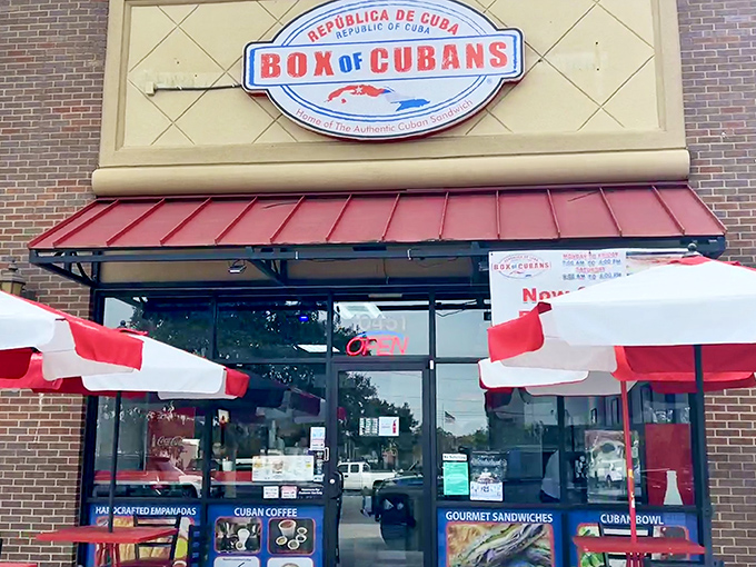 The unassuming storefront promises authentic Cuban flavors without the airfare. Red awnings and that iconic sign beckon sandwich seekers from miles around.